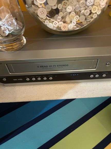 Lamp, buttons, vcr/dvd player - Kaufman Realty & Auctions