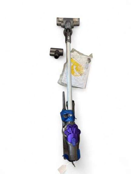 DYSON HANDHELD SWEEPER - Kaufman Realty & Auctions