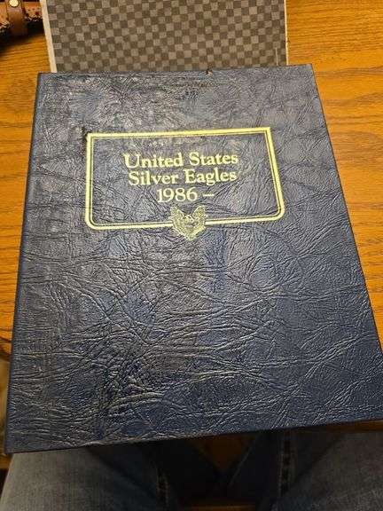 1986-2002 SILVER EAGLES IN ALBUM 17 COINS BU - Kaufman Realty & Auctions