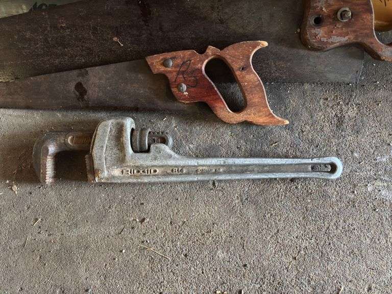Ridgid Pipe Wrench / Hand Saws - Kaufman Realty & Auctions