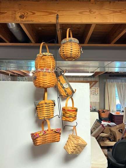 Metal hanging rack w/ (7) Longaberger baskets - Kaufman Realty & Auctions