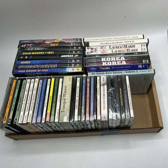 DVDS, CDS, AND BLUE RAY - Kaufman Realty & Auctions