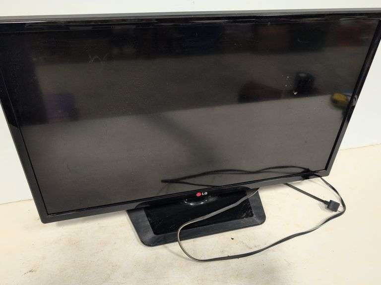 32" LG flat screen TV - Kaufman Realty & Auctions