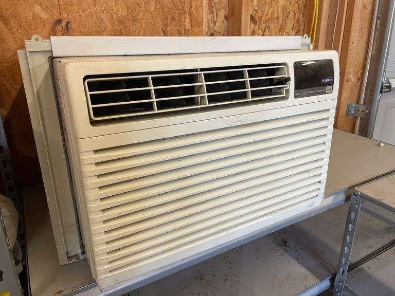 Kenmore window AC unit with remote - works - Kaufman Realty & Auctions