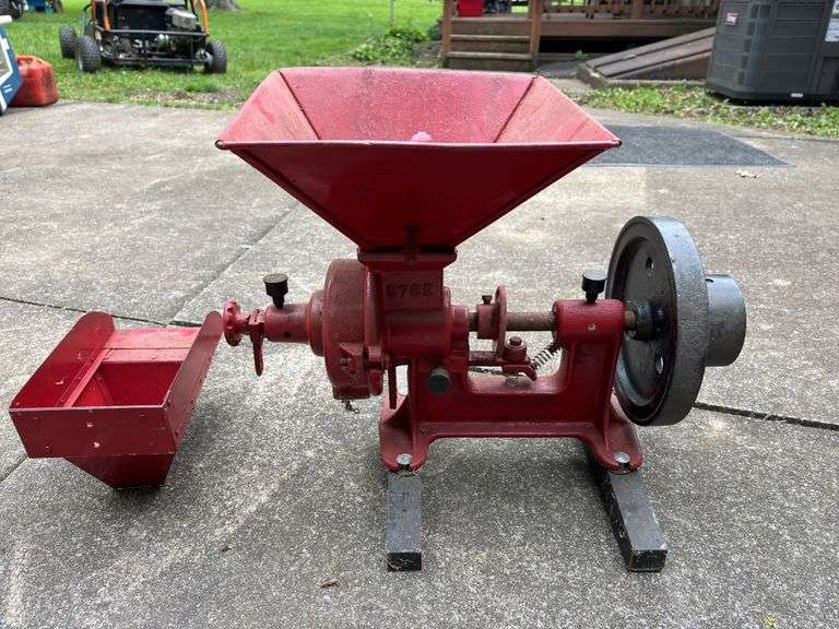 Vintage grain grinder - Kaufman Realty & Auctions