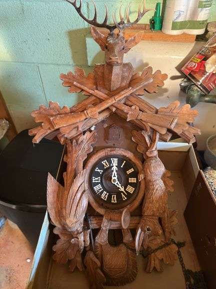 VINTAGE CUCKOO CLOCK WITH WEIGHTS - Kaufman Realty & Auctions