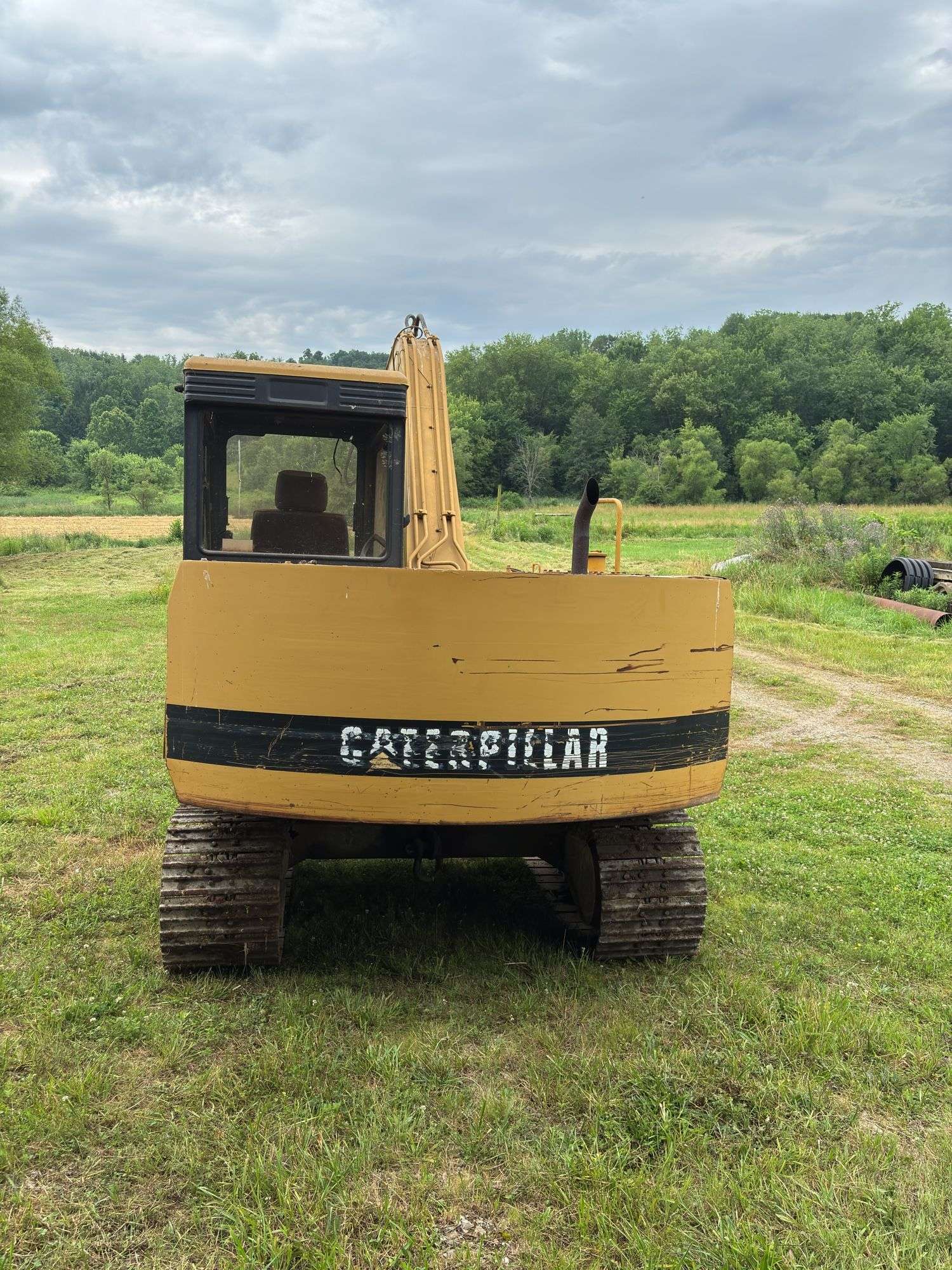Cat E 70 B trackhoe - Kaufman Realty & Auctions
