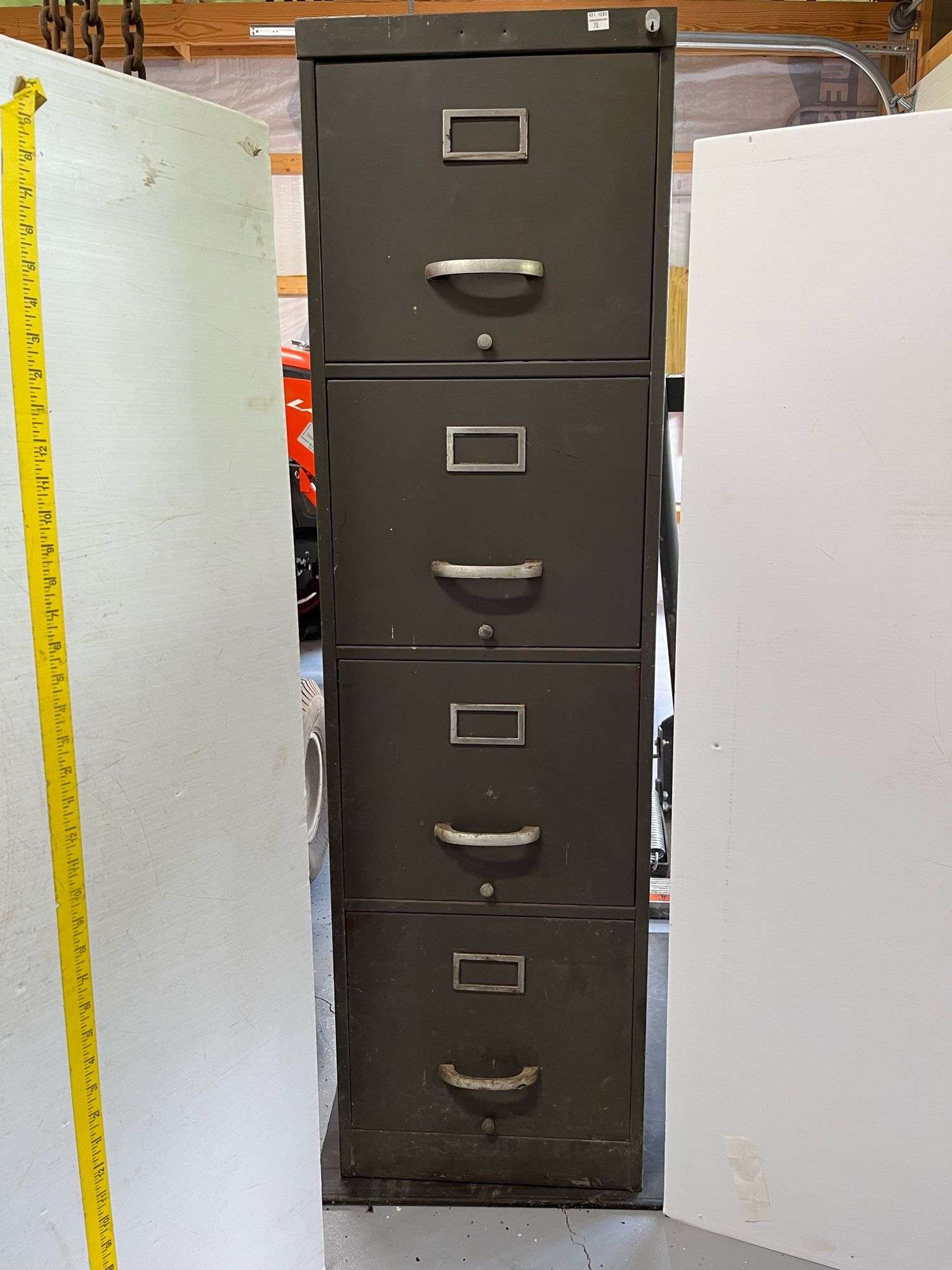 Four Drawer Filing Cabinet - Kaufman Realty & Auctions