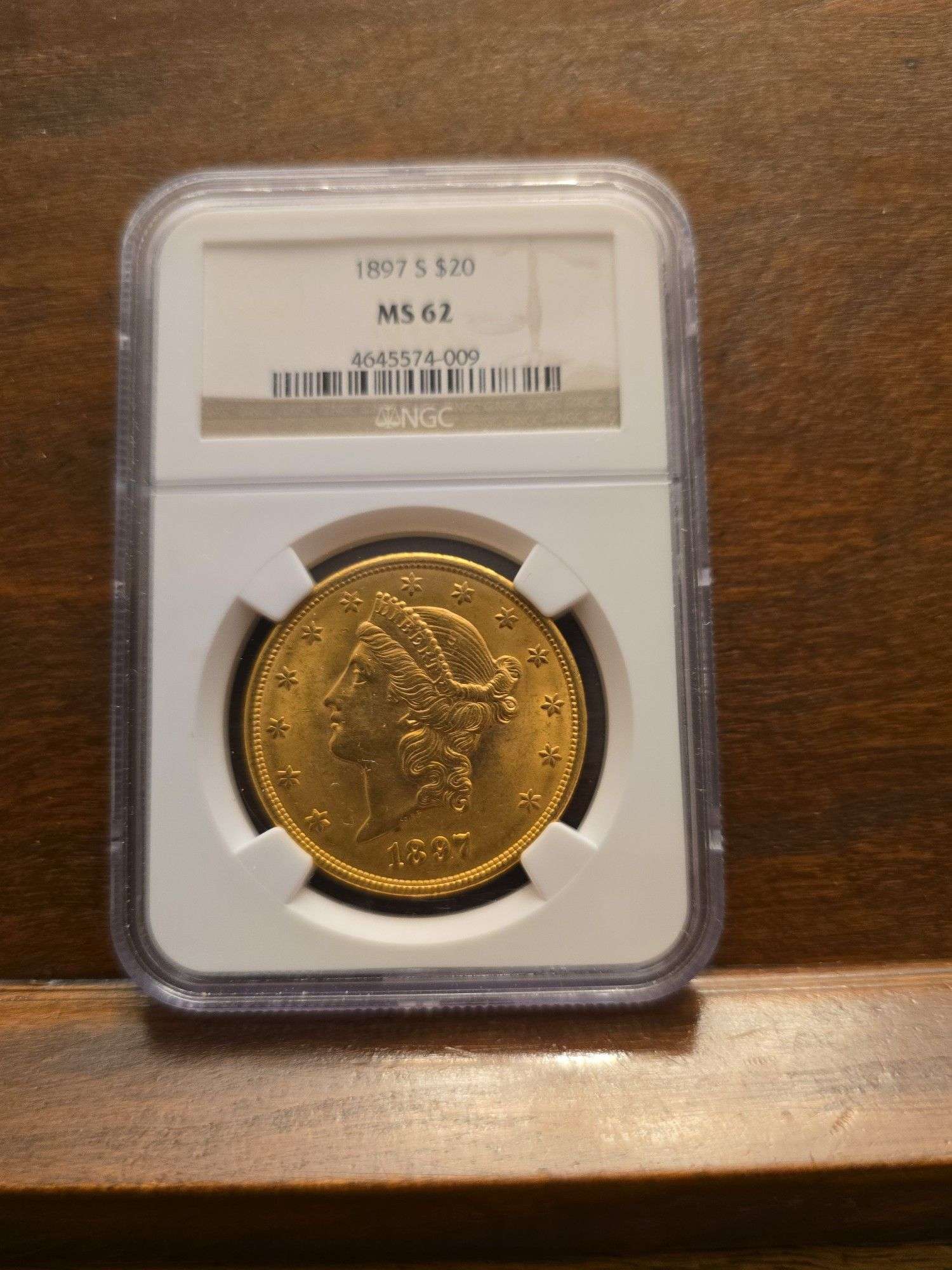 1897S $20. LIBERTY HEAD GOLD PIECE NGC MS62 - Kaufman Realty & Auctions