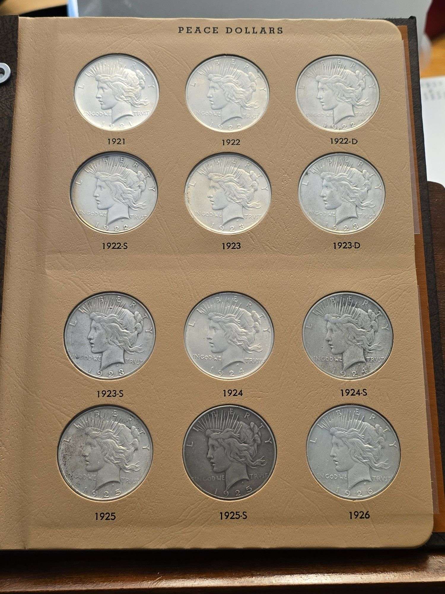 COMPLETE PEACE DOLLAR SET 1921,27,27D,28,34 UNC - Kaufman Realty & Auctions