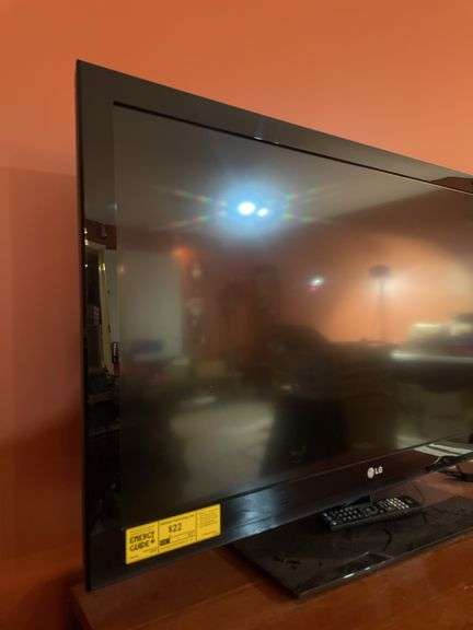 LG FLAT SCREEN TV WITH REMOTE - Kaufman Realty & Auctions