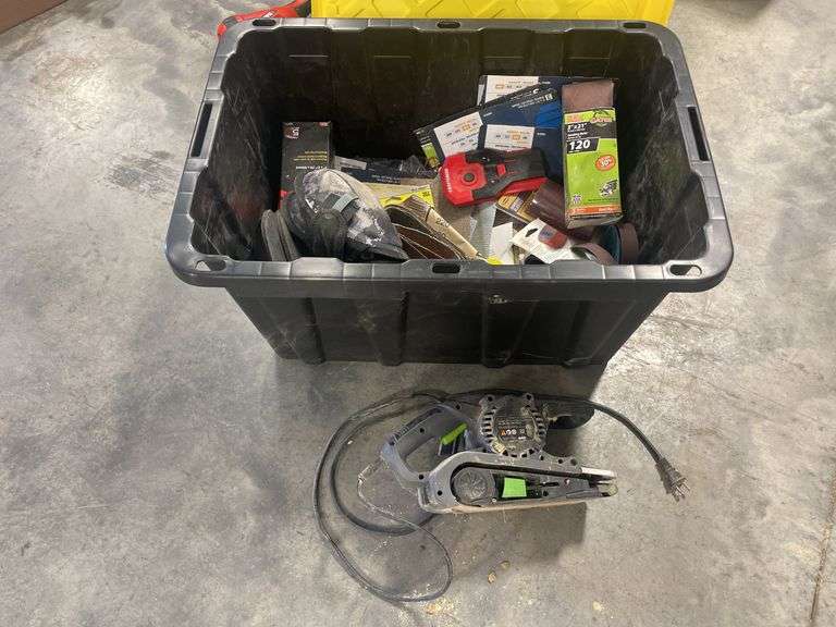 Genesis 3" x 21" belt sander with tote of sanding belts and other items ...