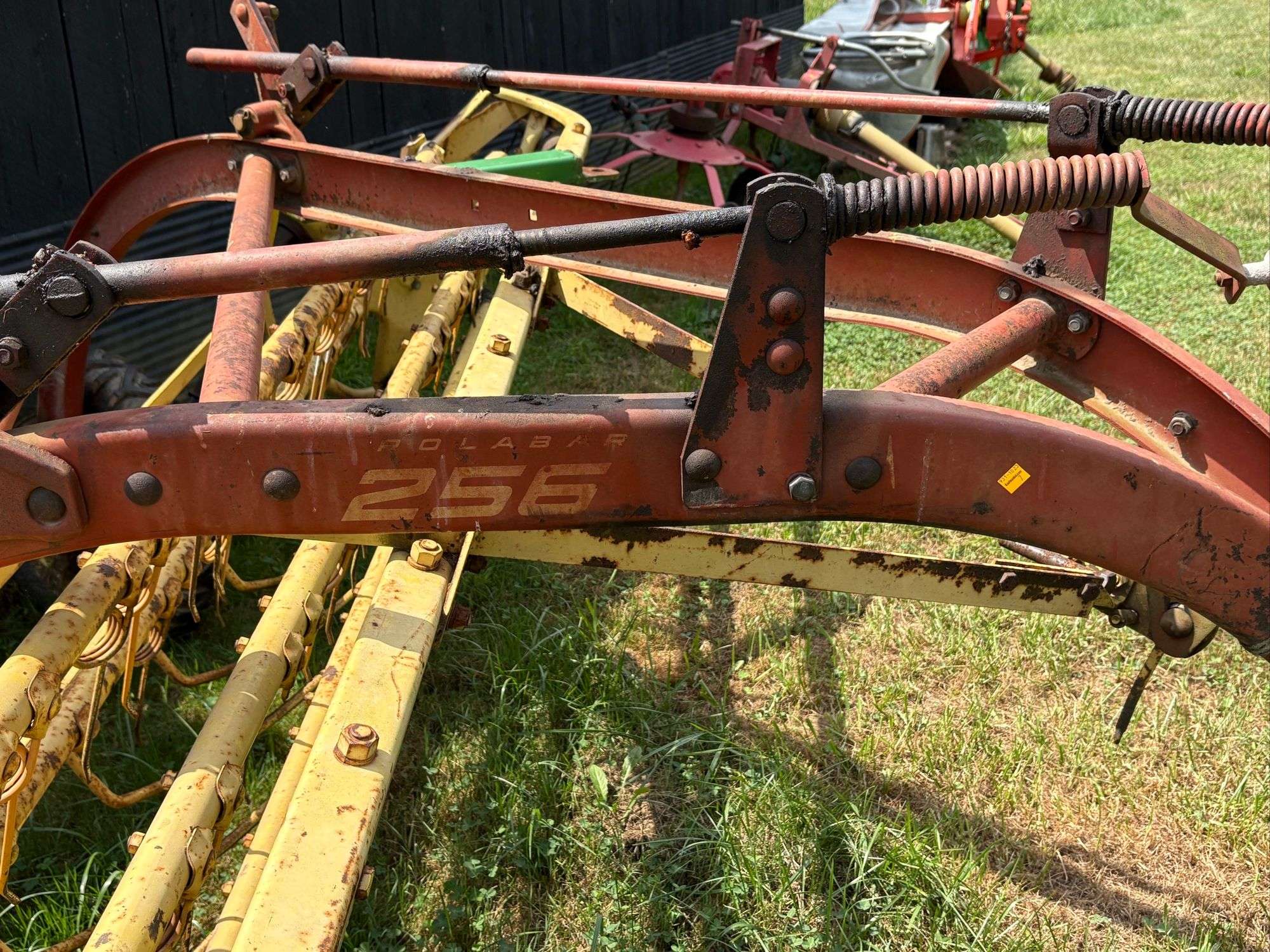 New Holland 256 Side Delivery Rake - Kaufman Realty & Auctions
