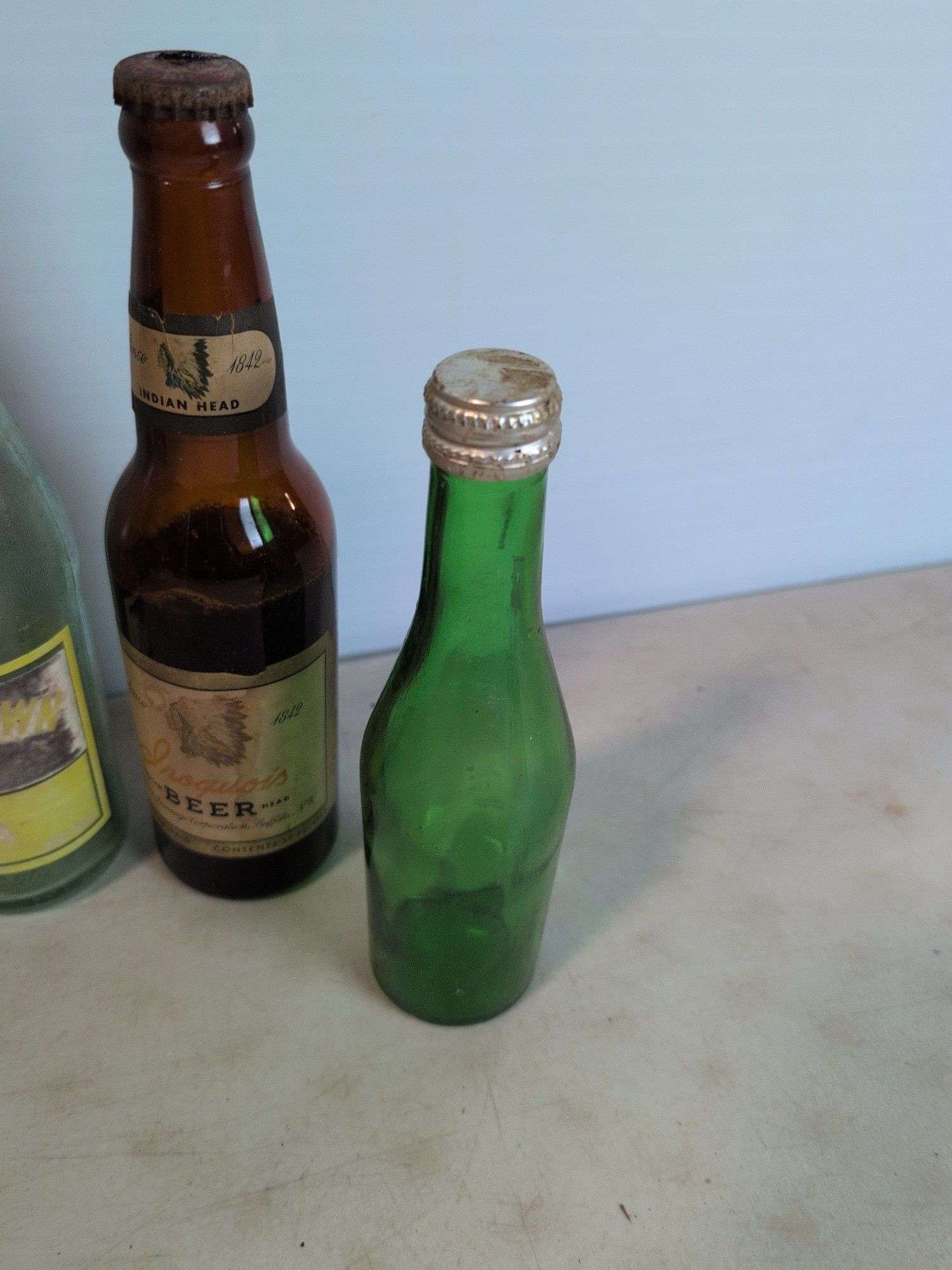 Vintage glass bottles - 7UP, Royal Crown, and others - Kaufman Realty & Auctions