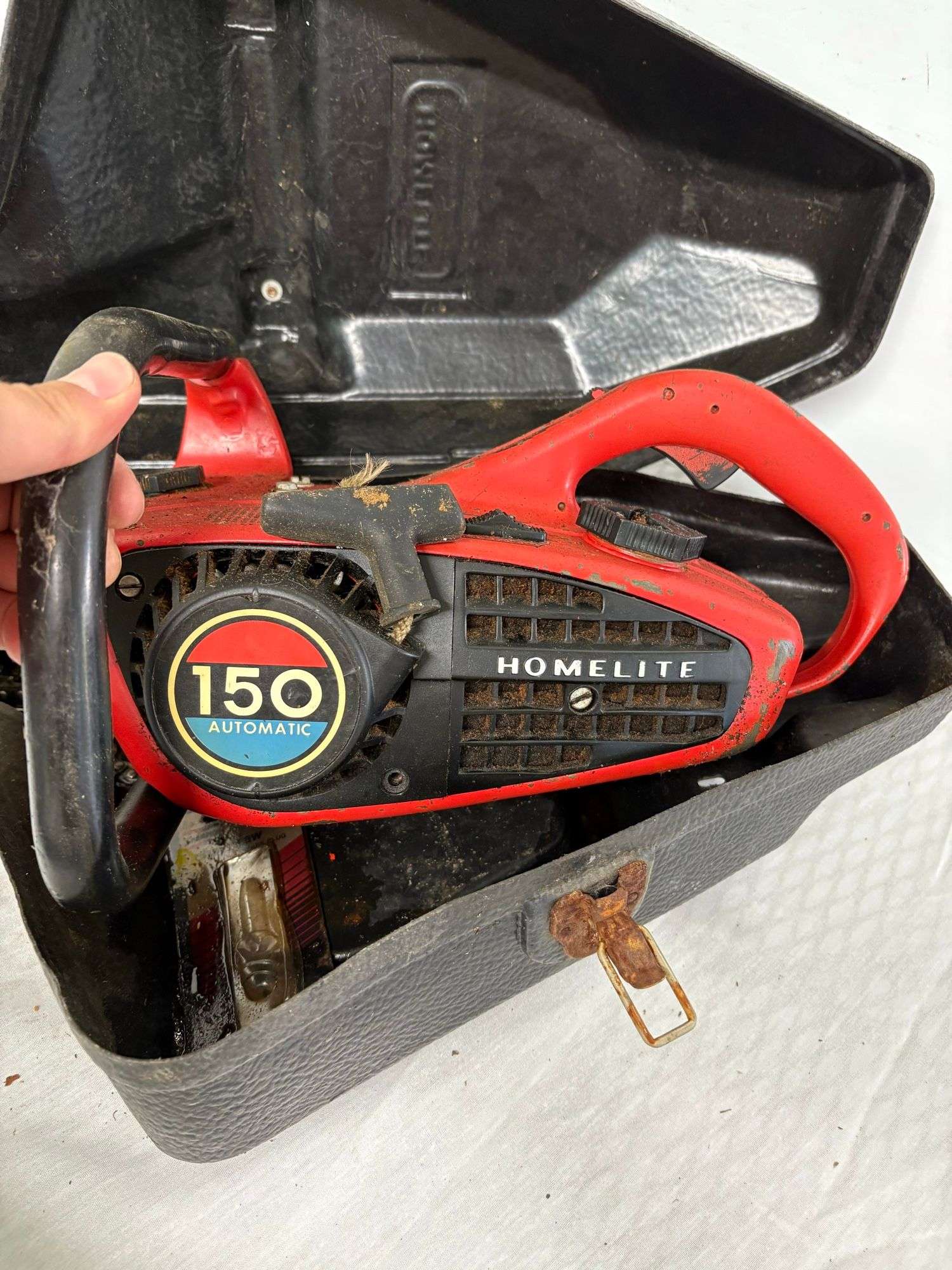 Vintage Homelite 150 Gas Chainsaw with Case - Kaufman Realty & Auctions