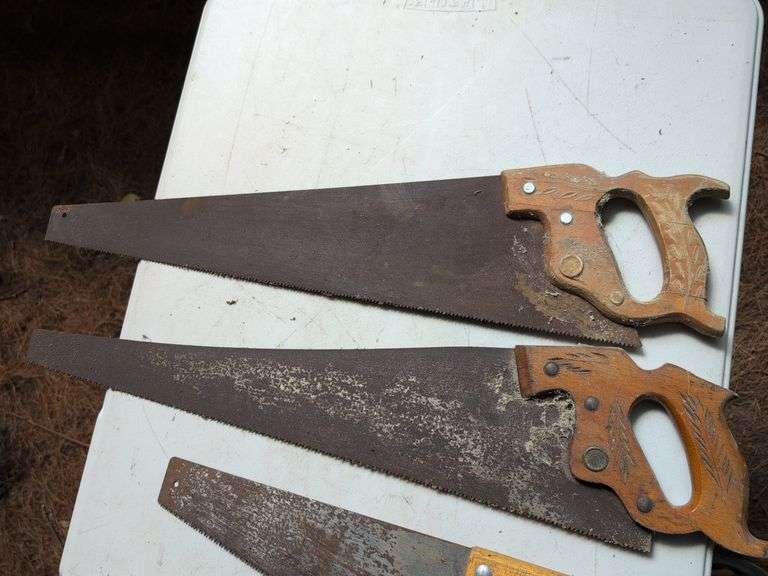 (6) hand saws - some antique with designs - Kaufman Realty & Auctions