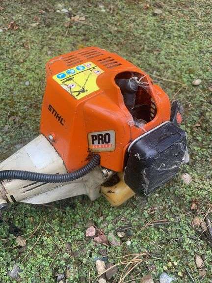 Stihl HT 75 extended chain saw trimmer - Kaufman Realty & Auctions