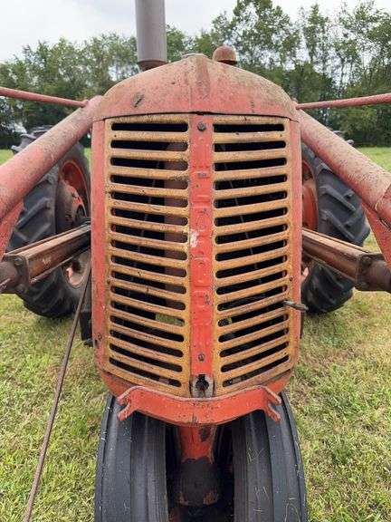 Co-op Tractor w/ loader. Runs - Kaufman Realty & Auctions