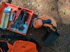 Stihl MS 201C chainsaw, protective helmet, and extra chains - Kaufman ...