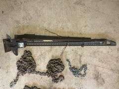 Winch hoist with (2) double hook larger rusty chains and (2) small ...