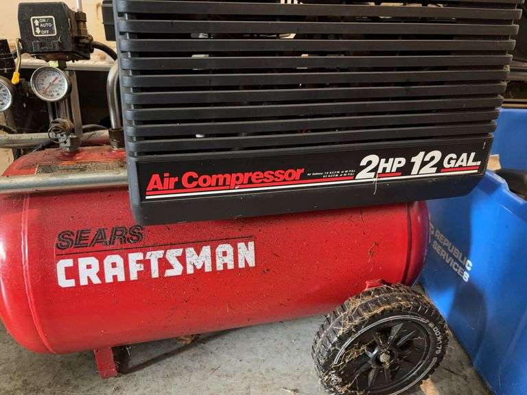 Craftsman 2 hp 12 gallon air compressor - Kaufman Realty & Auctions