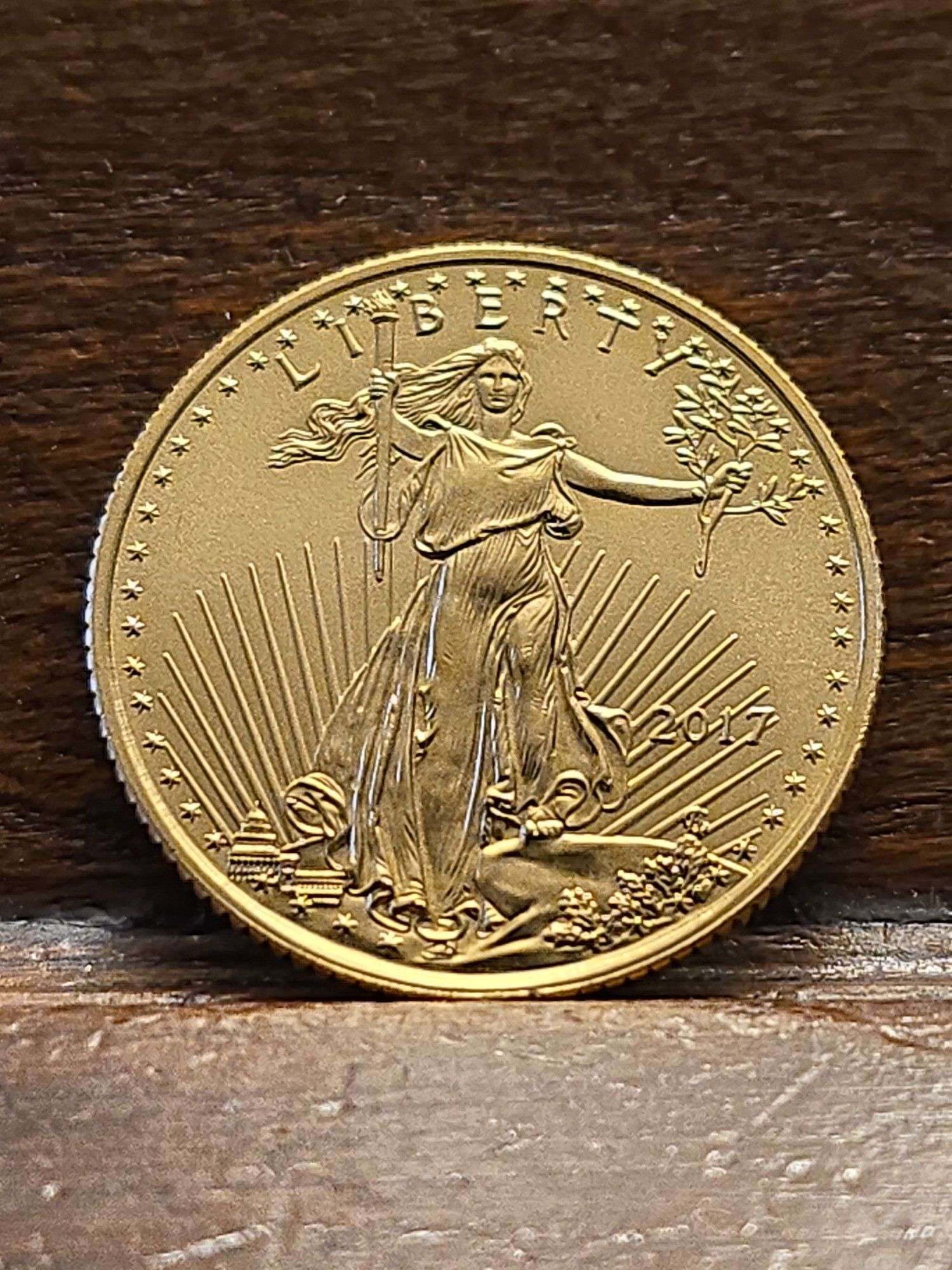 2017 $5. 1/10TH. OZ. GOLD EAGLE BU - Kaufman Realty & Auctions